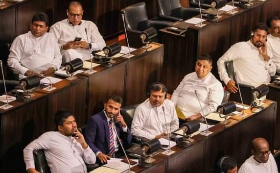 Newly Elected MP Wears School Tie